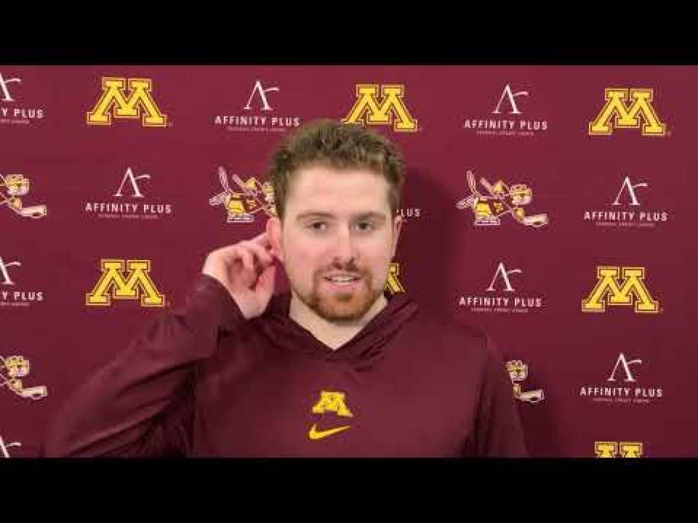 Minnesota Gophers coach Bob Motzko, Mike Koster and Mason Nevers ...
